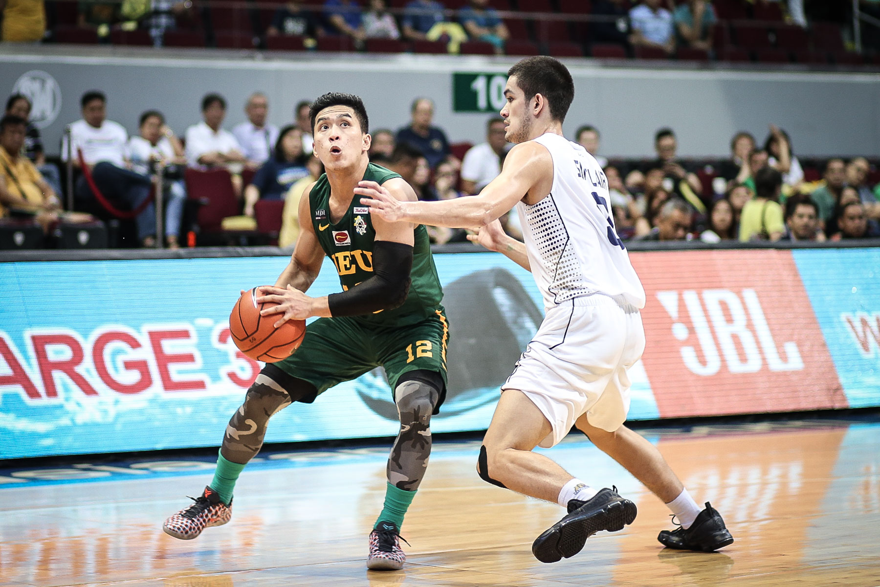 Arong's game-winner lifts FEU past NU