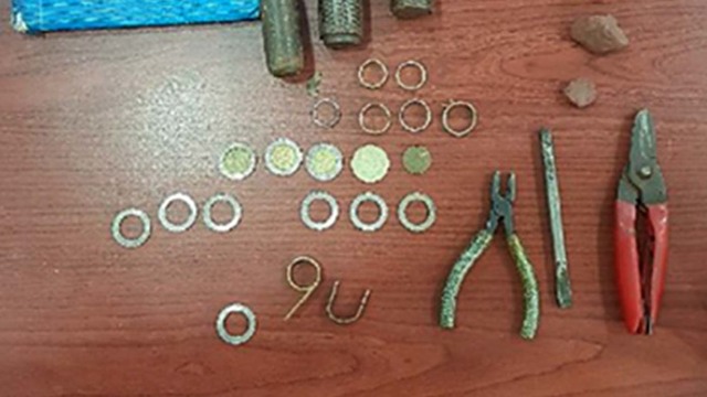 2 arrested in Quezon for mutilating P10 coins